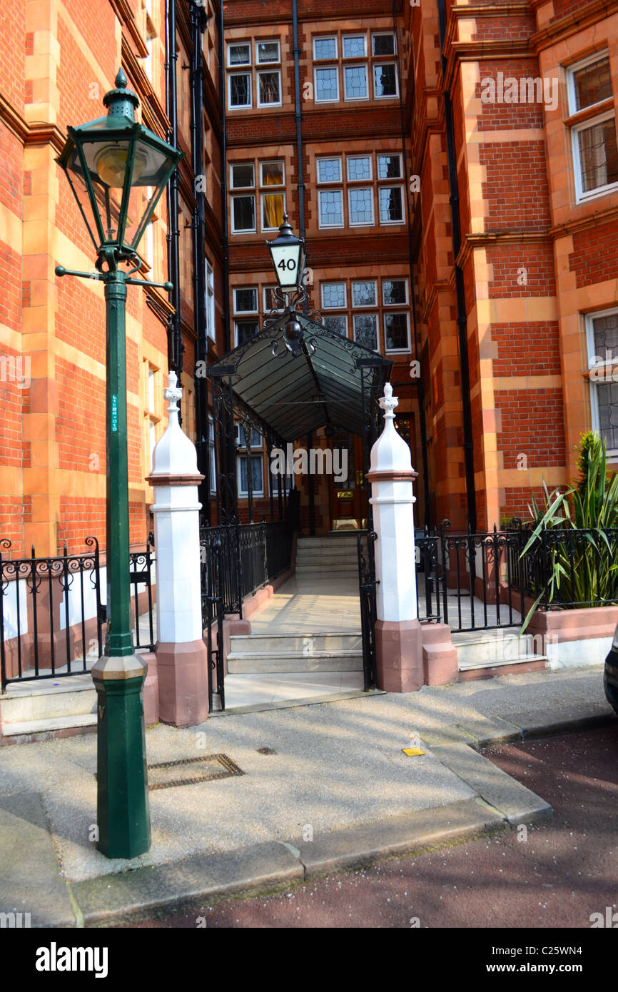 Entrance of luxury red brick condominium in Kensington, London, UK ...