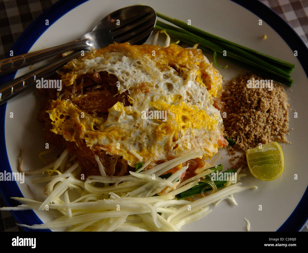 Pad Thai Hor Khai ( Pad Thai wrap with egg), thai street food , back ...