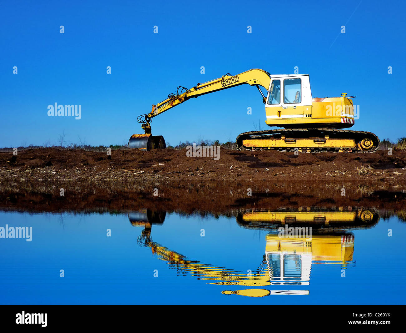 digger in the moor Stock Photo - Alamy