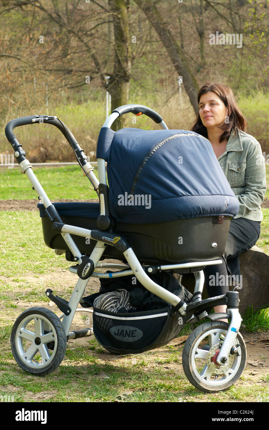 Pushing a babies pram hi-res stock photography and images - Alamy