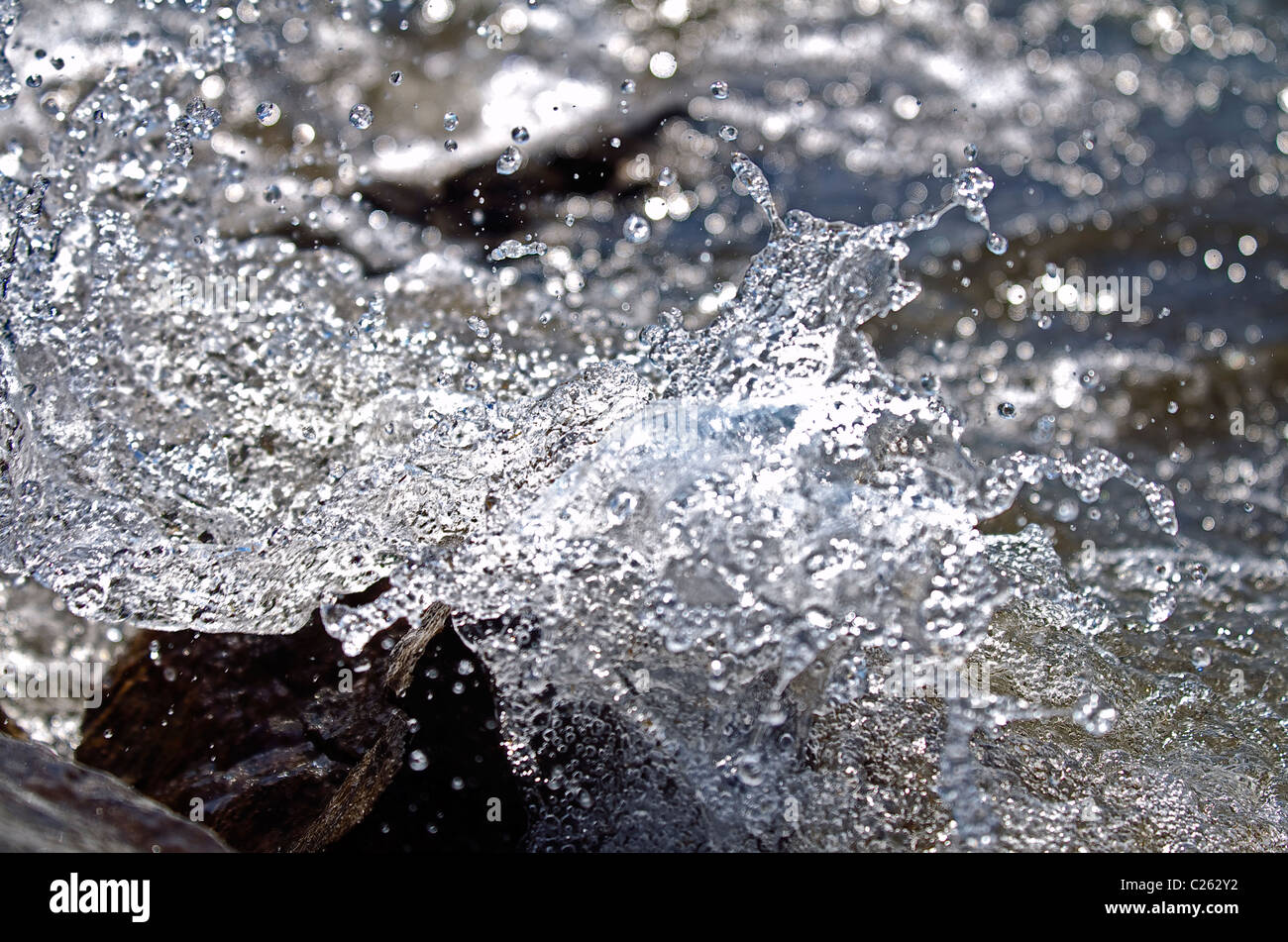 Photo of water crashing over rocks Stock Photo - Alamy