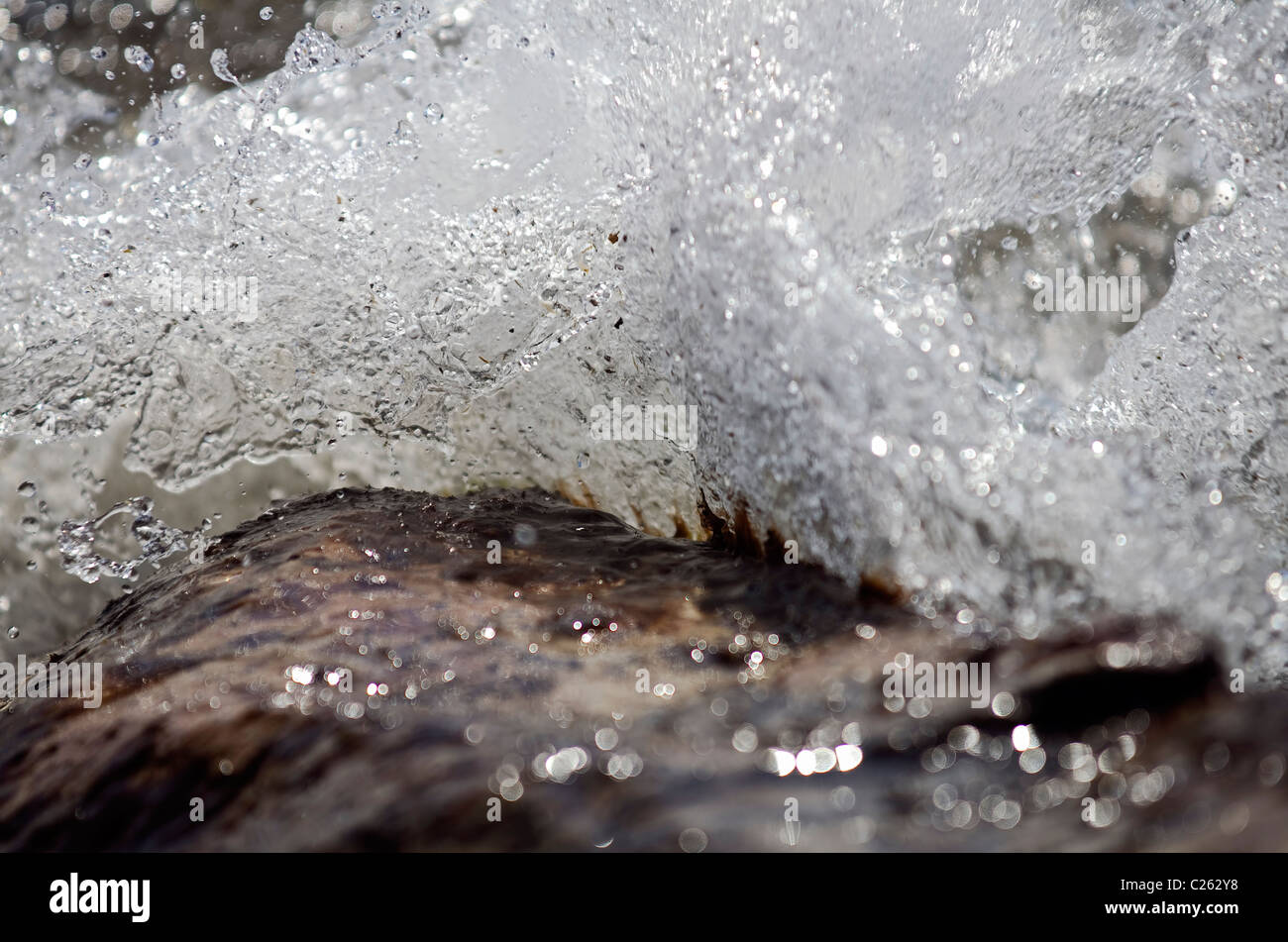 Photo of water crashing over rocks Stock Photo - Alamy