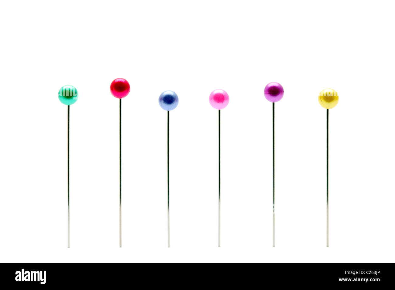 Colorful pins isolated on white background Stock Photo - Alamy