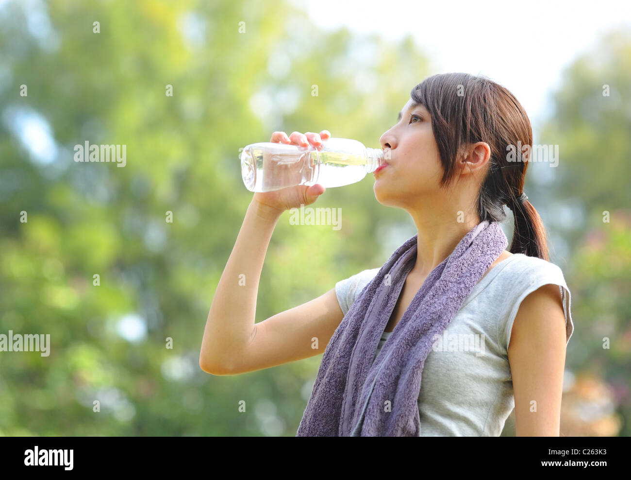 woman drink water after sport Stock Photo - Alamy