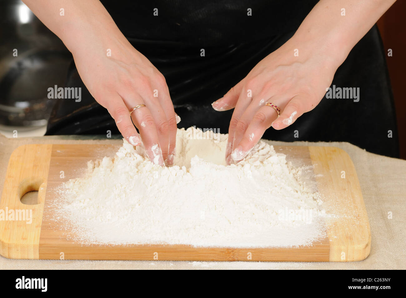Preparation of the test for a baking of rolls Stock Photo - Alamy