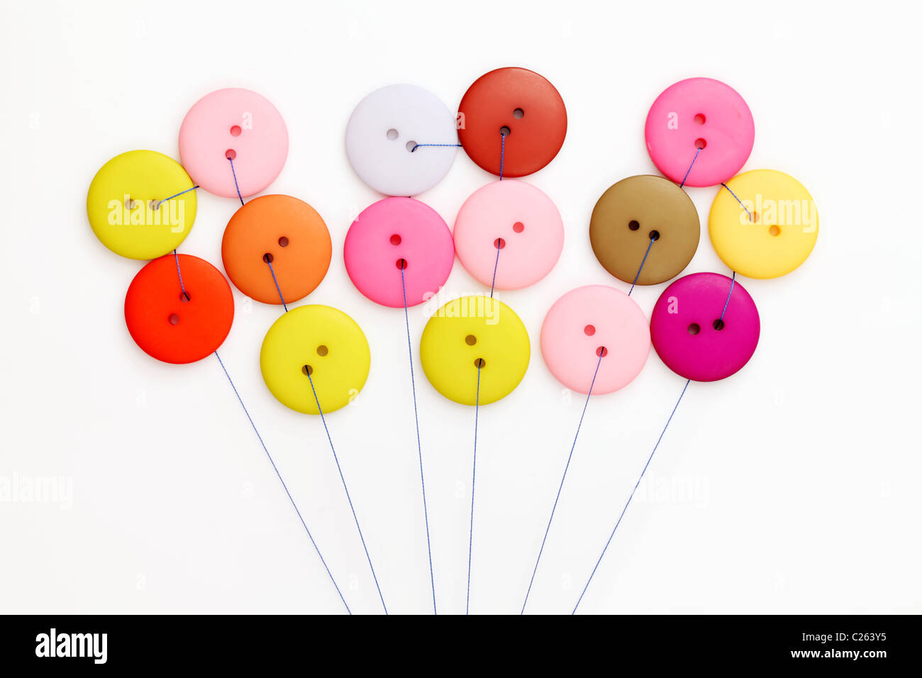 Colorful buttons and string isolated on white background Stock Photo ...