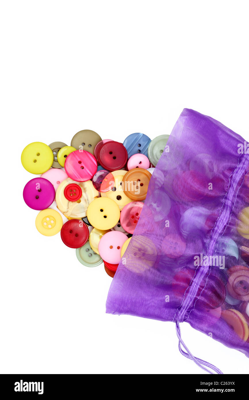 Buttons and bag isolated on white background Stock Photo - Alamy
