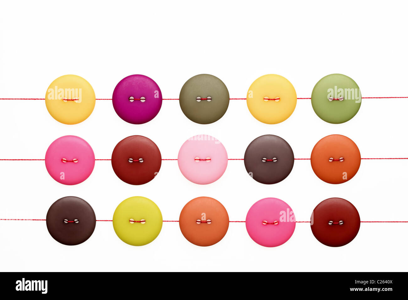 Colorful buttons and string isolated on white background Stock Photo ...