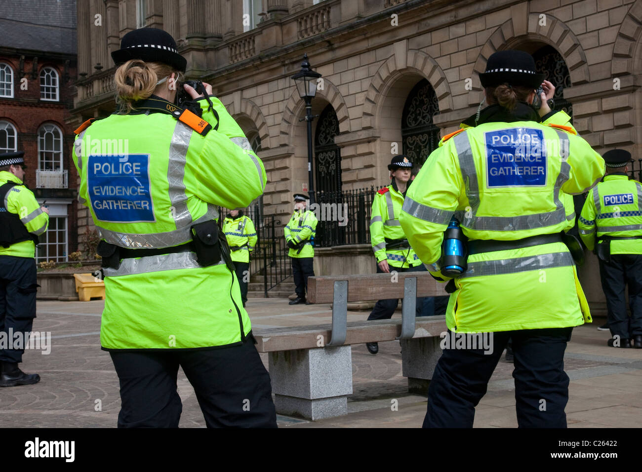 Evidence gathering Female Police Officers filming the English Defence ...