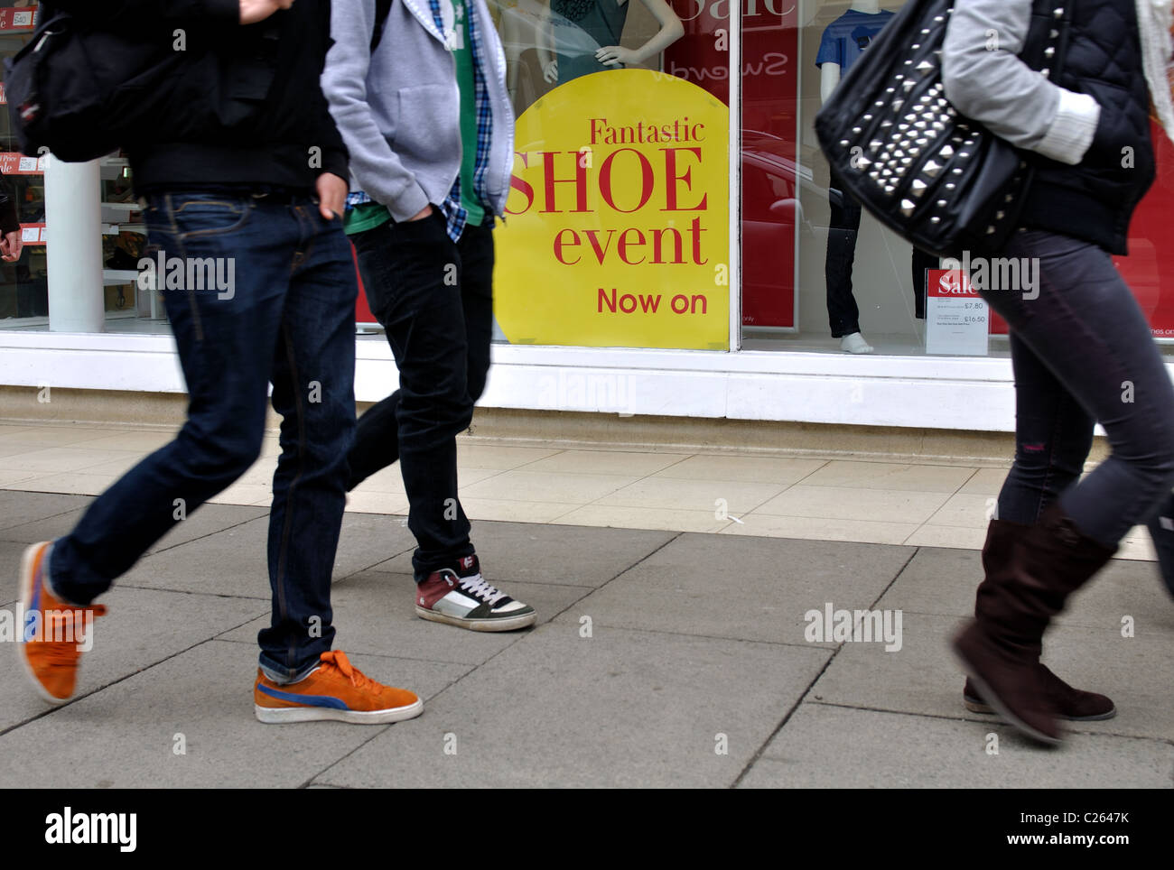 Shoe event sign in shop window Stock Photo - Alamy