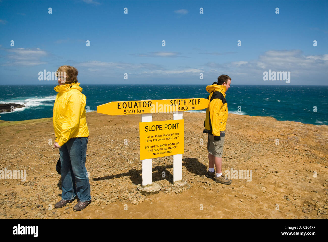 Windswept visitors at Slope Point - the southernmost point of New ...