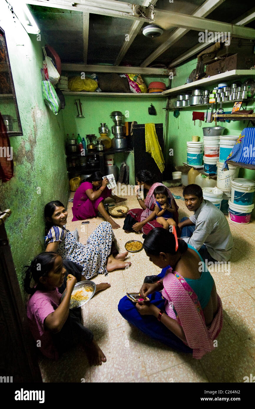 Indian family in the house, Daily life in the slum near Colaba, Mumbai ...