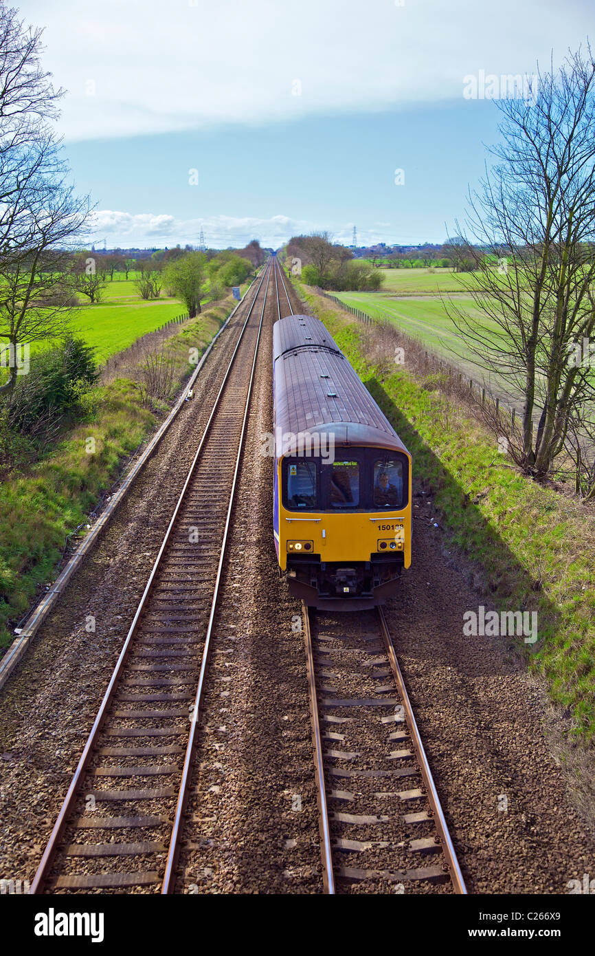 Diesel multiple unit train on converging railway lines. Class 150 Stock ...