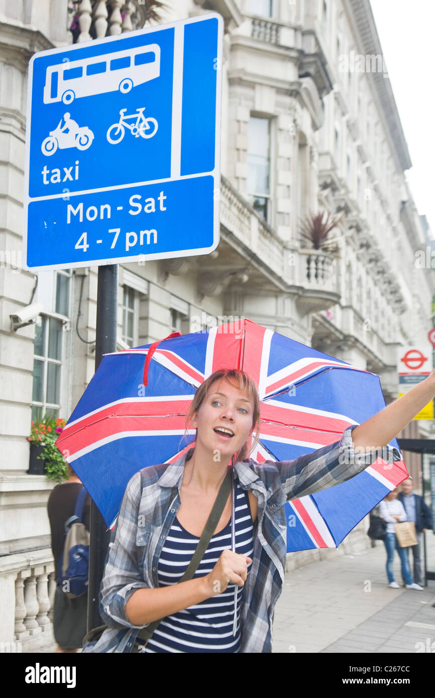 London taxi with union jack hi-res stock photography and images - Alamy