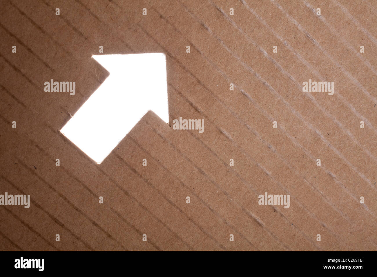 Arrow Sign and cardboard for background Stock Photo - Alamy