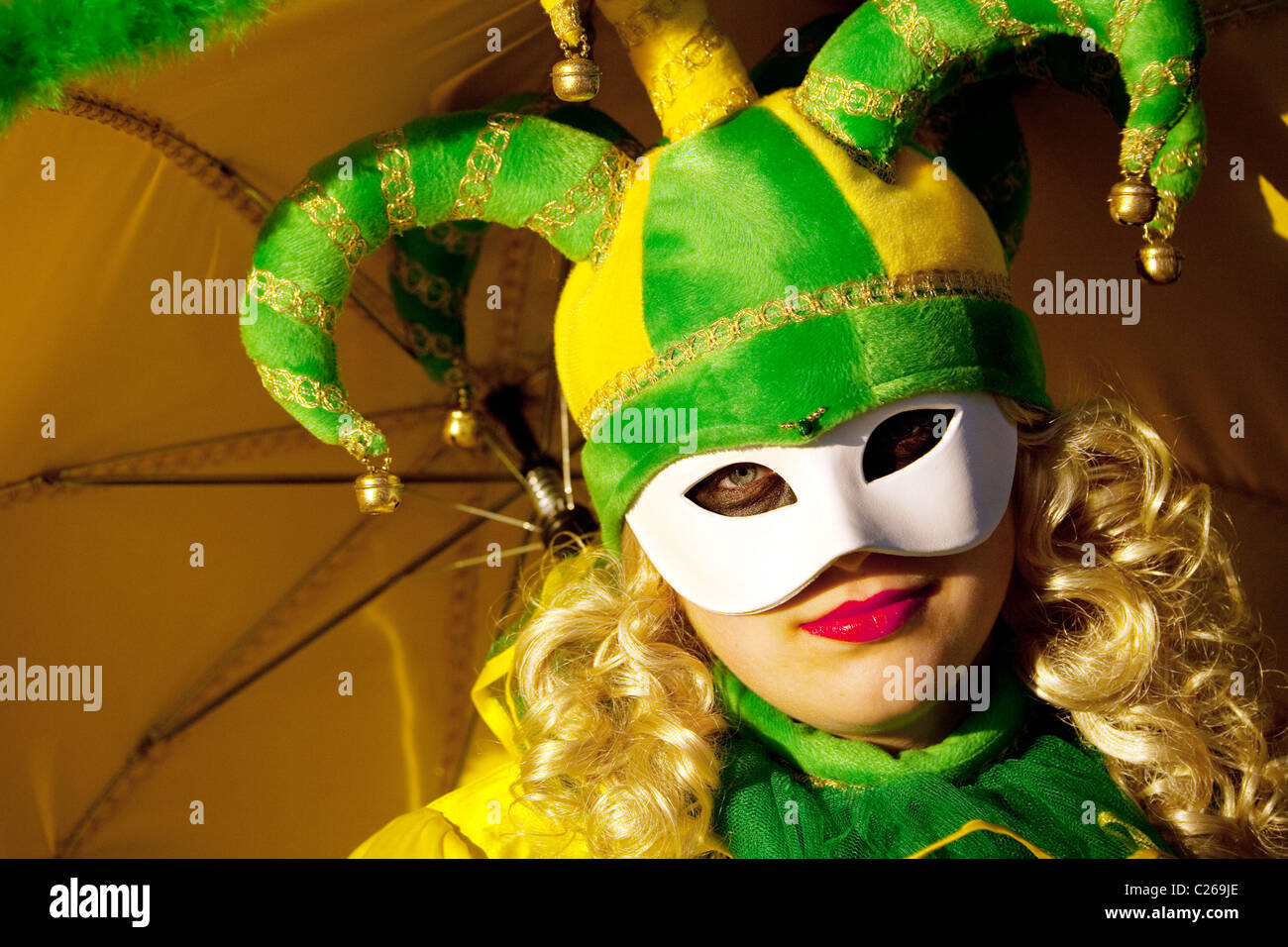 Clown in yellow and green, the Venice carnival, Venice Italy Stock ...