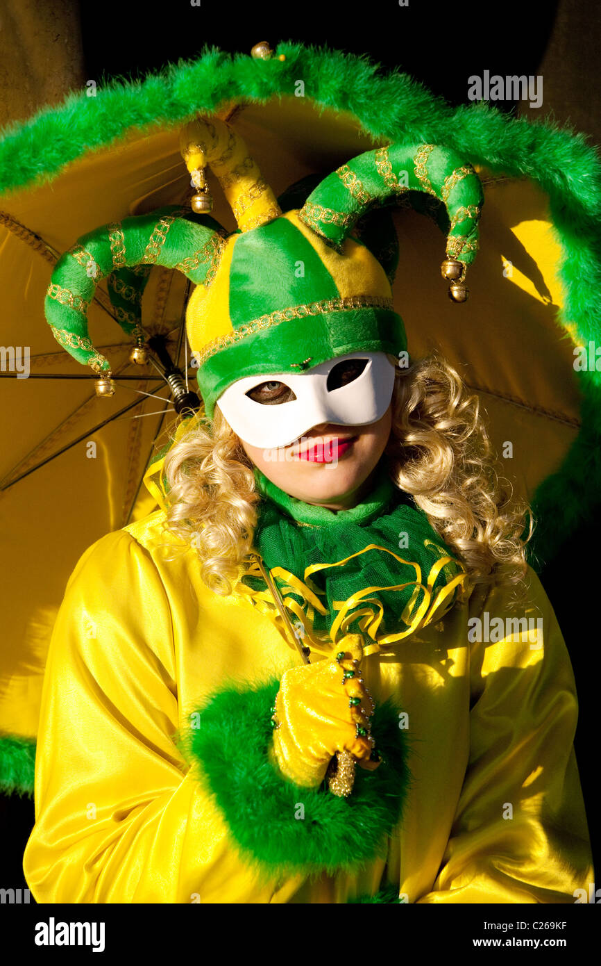 Clown in yellow and green, the Venice carnival, Venice Italy Stock ...