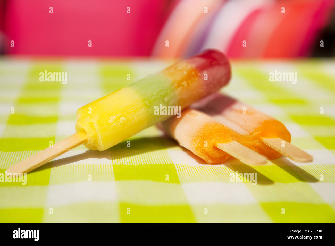 Colorful ice pops in the summer sun Stock Photo - Alamy