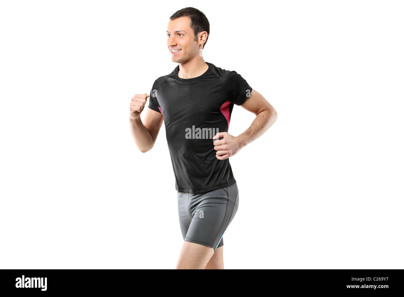 Portrait of a male athlete running Stock Photo - Alamy