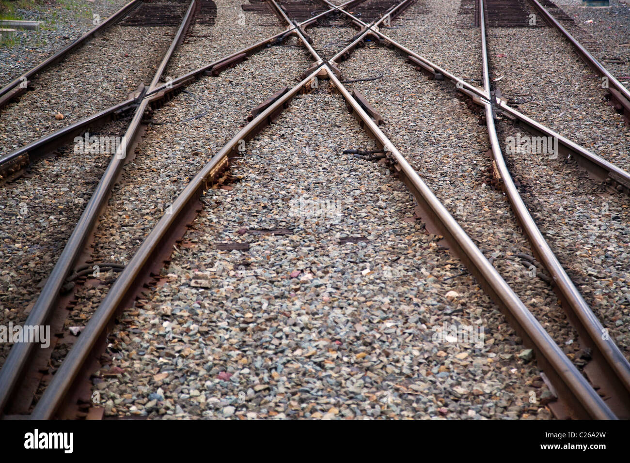 Rail tracks crossing Stock Photo - Alamy