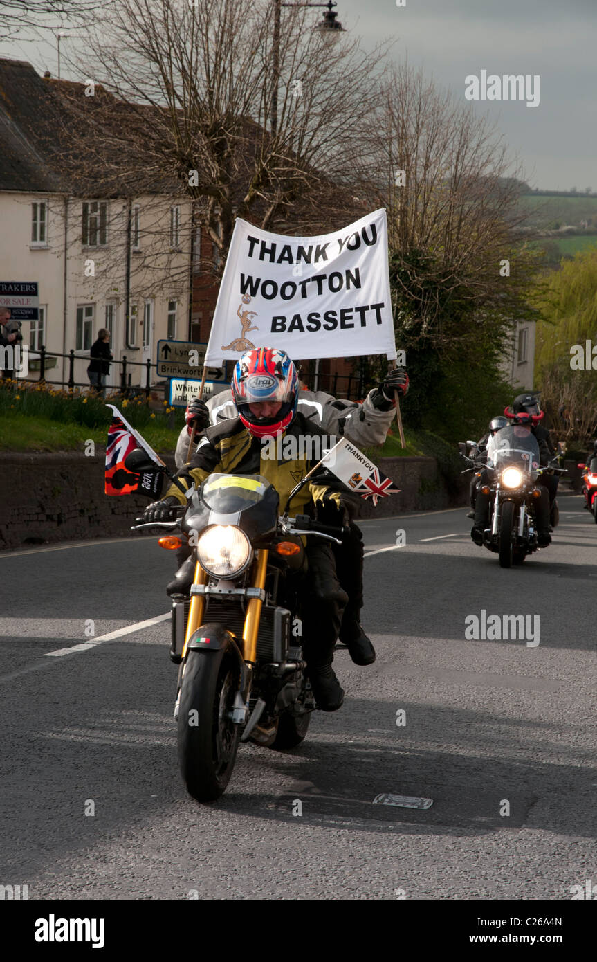 Pillion rider holding his 'Thank you Wootton Bassett' Banner during the ...