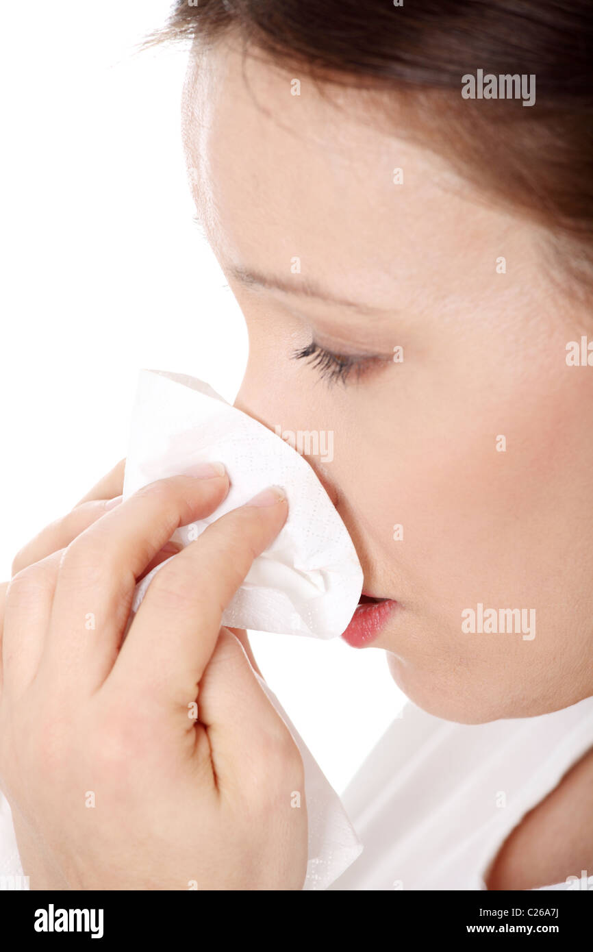 35-40 year old woman with tissue, heaving allergy or cold. Isolated on ...