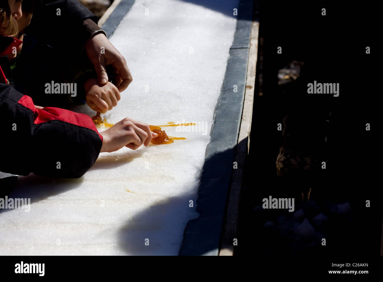 Maple taffy making hi-res stock photography and images - Alamy