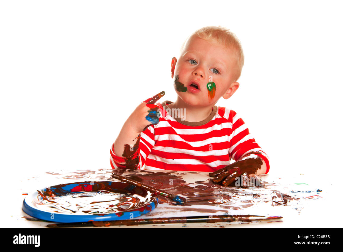 Child making mess with paint hi-res stock photography and images - Alamy