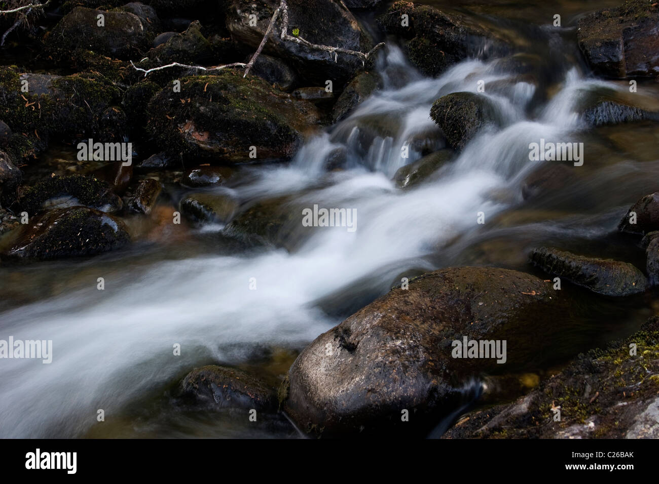 Stream waterfall blur movement water rocks river brook cascade white hi ...
