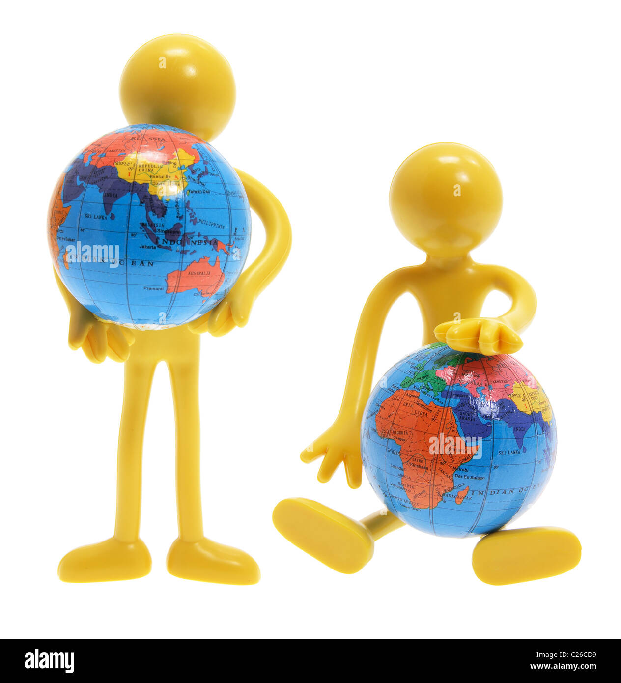 Miniature Rubber Figures with Globes Stock Photo - Alamy