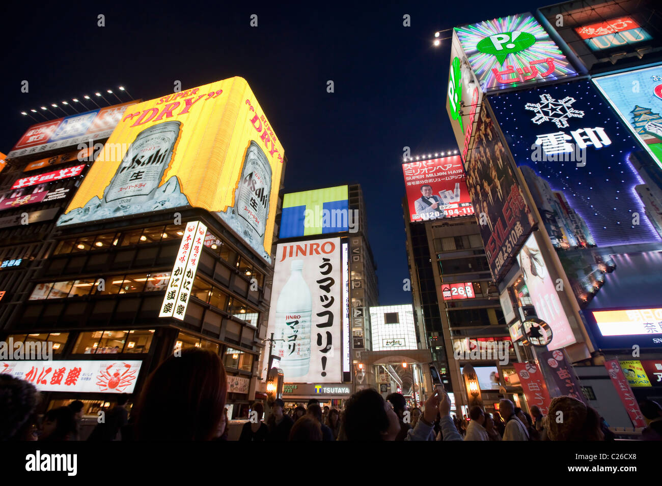 Bright neon lights of restaurants and clubs in Dotombori area at night ...