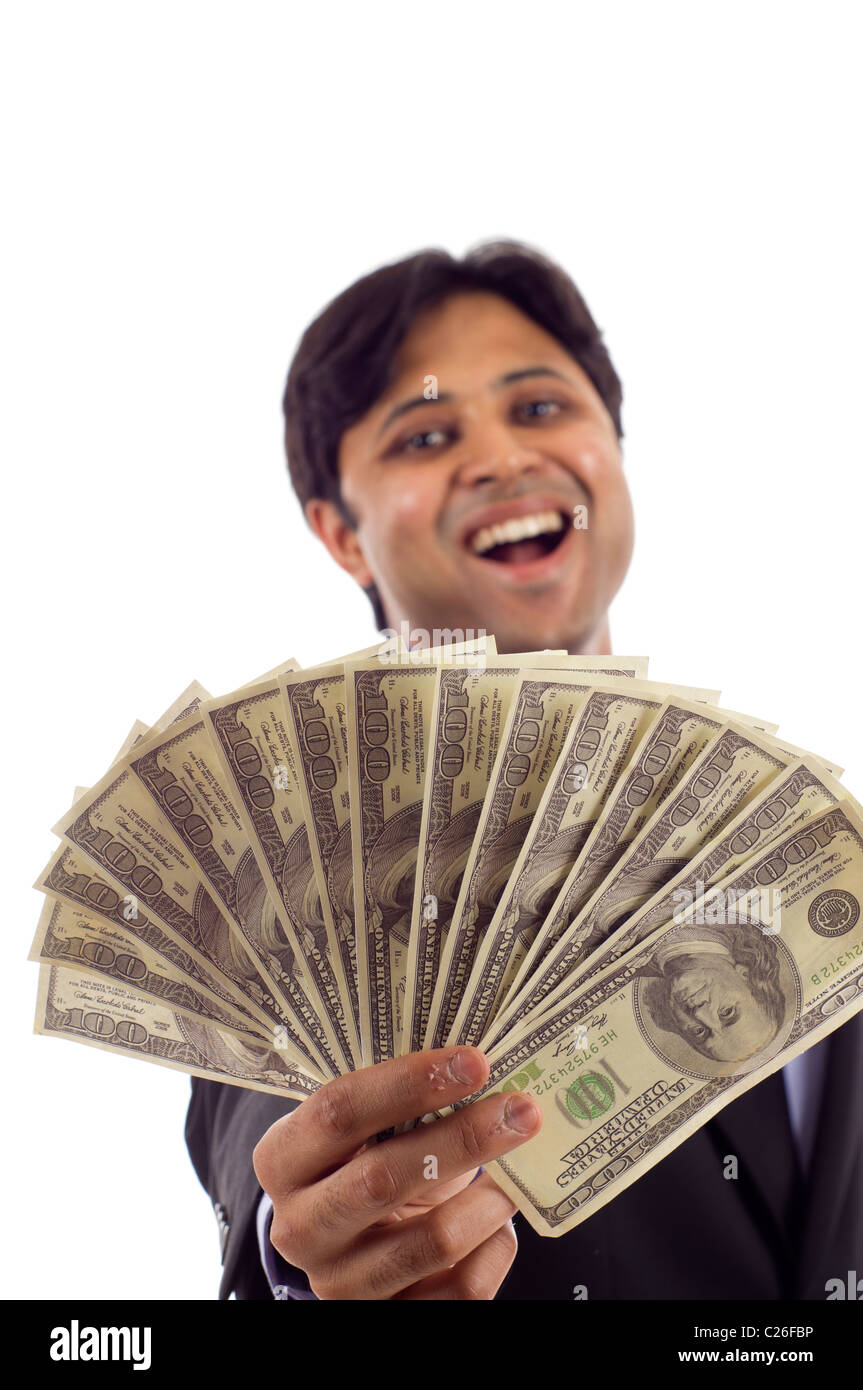 Happy smiling indian man holding indian money hi-res stock photography ...