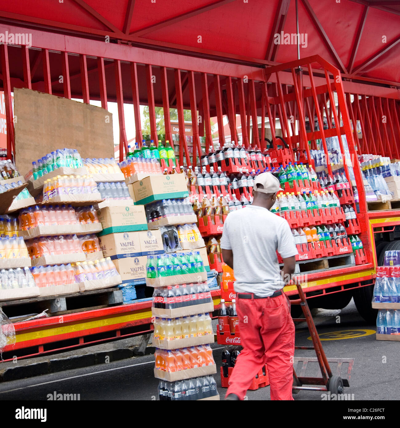 Man delivering goods from Coca Cola truck - South Africa Stock Photo ...