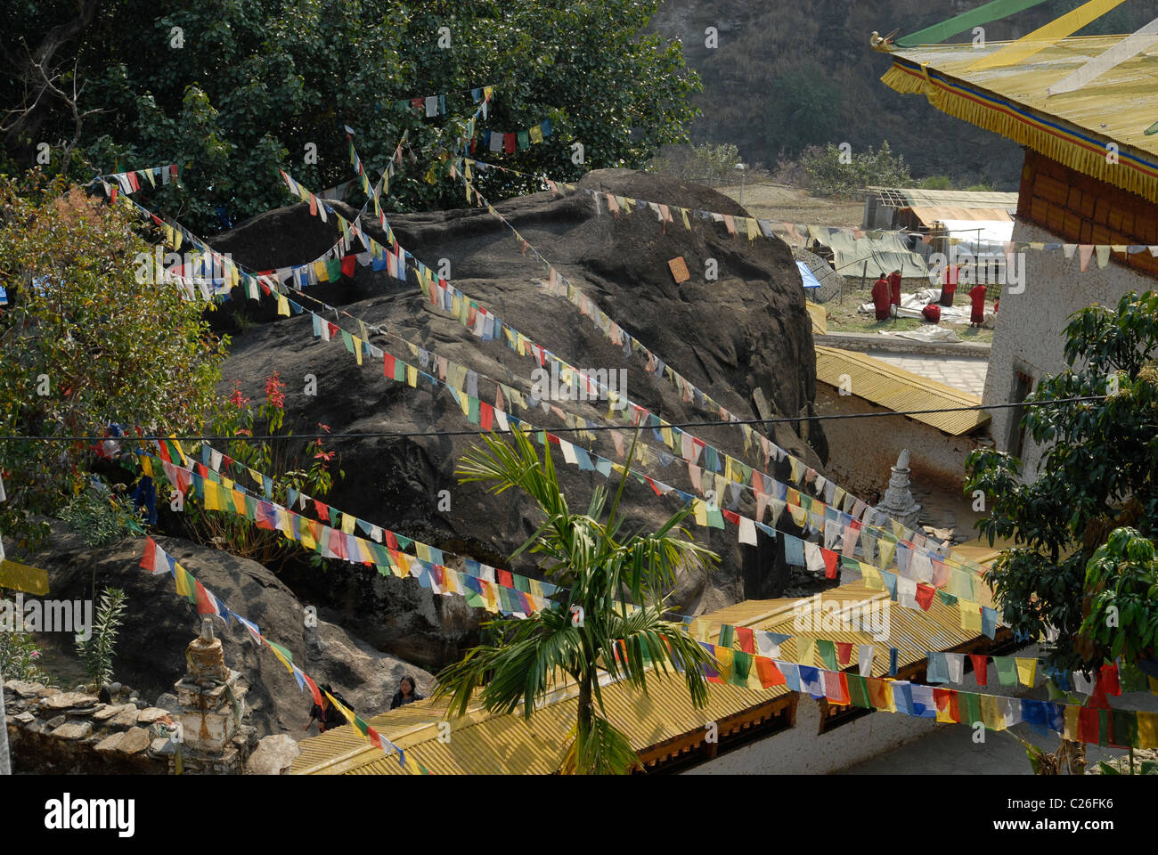 The rock at Gom Kora temple, a sacred meditation site of Guru Rimpoche ...