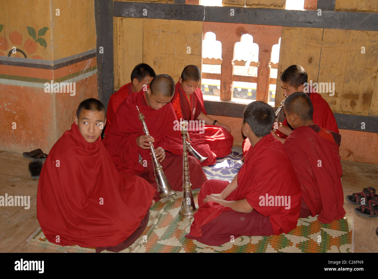 Young monks with their instruments inside the monastery in ...