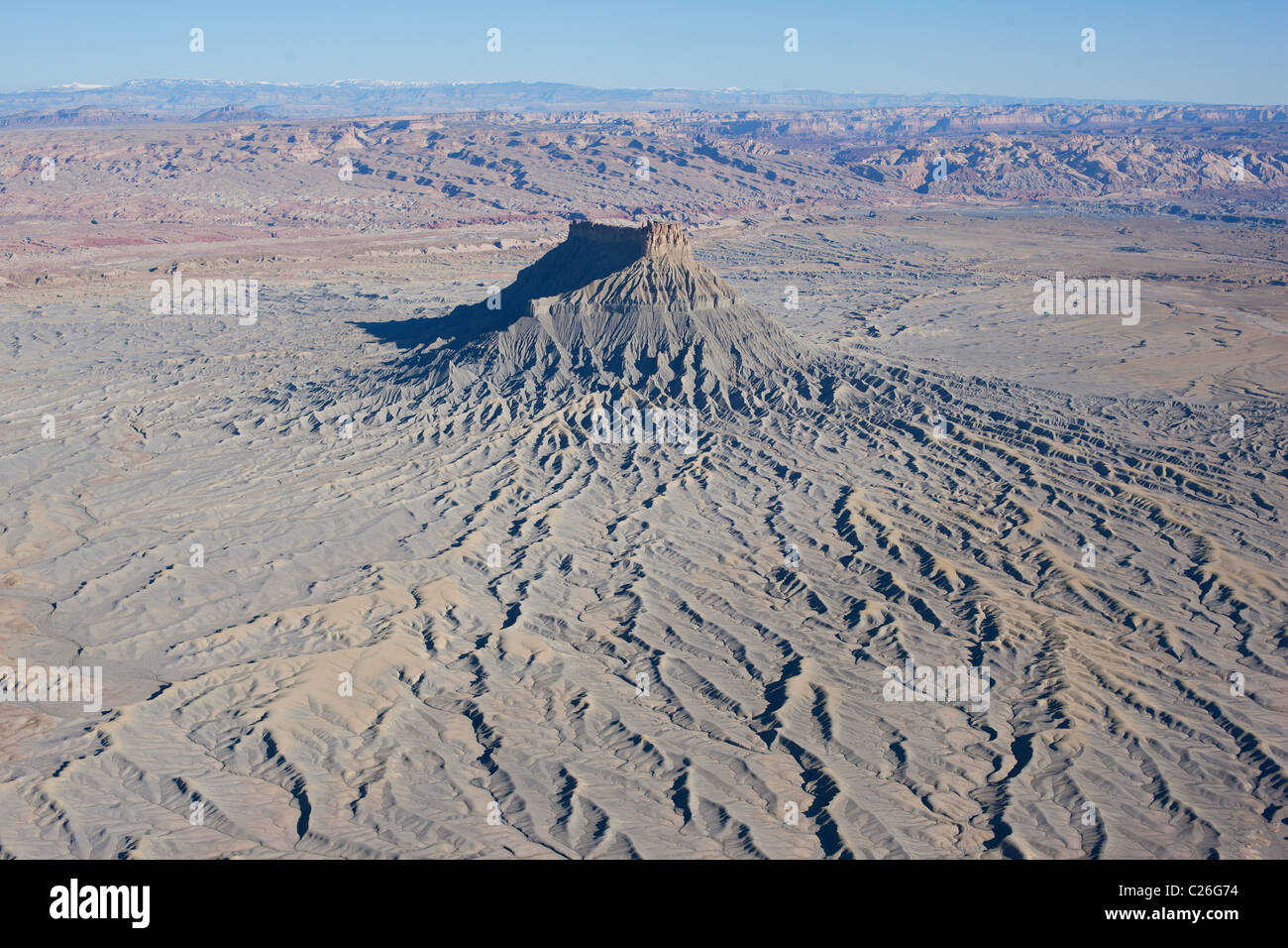 AERIAL VIEW. Butte emerging (by about 500 meters) out of the relatively ...