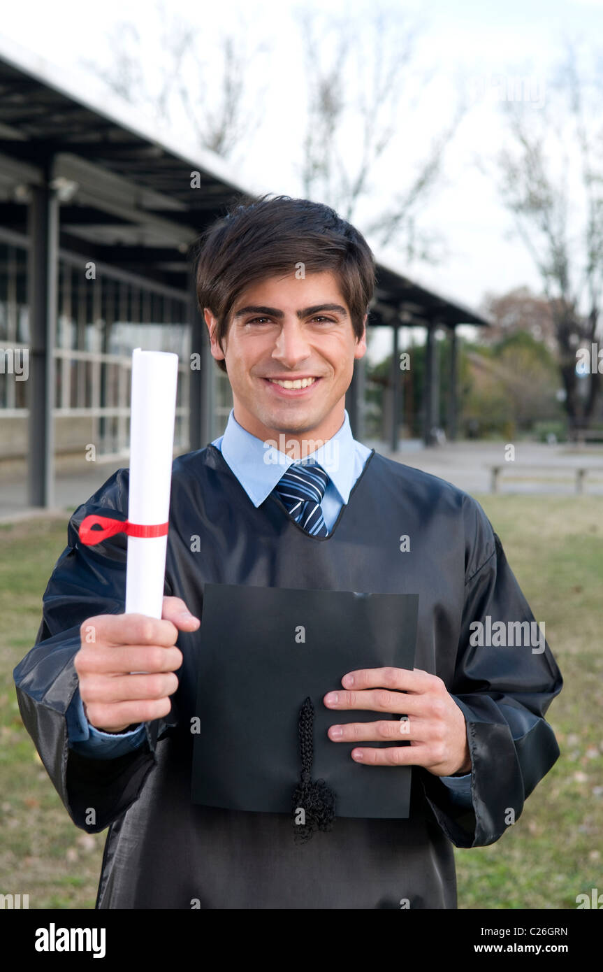 A, student, man, guy, smile, smiling, looking, at, the, camera, stand ...