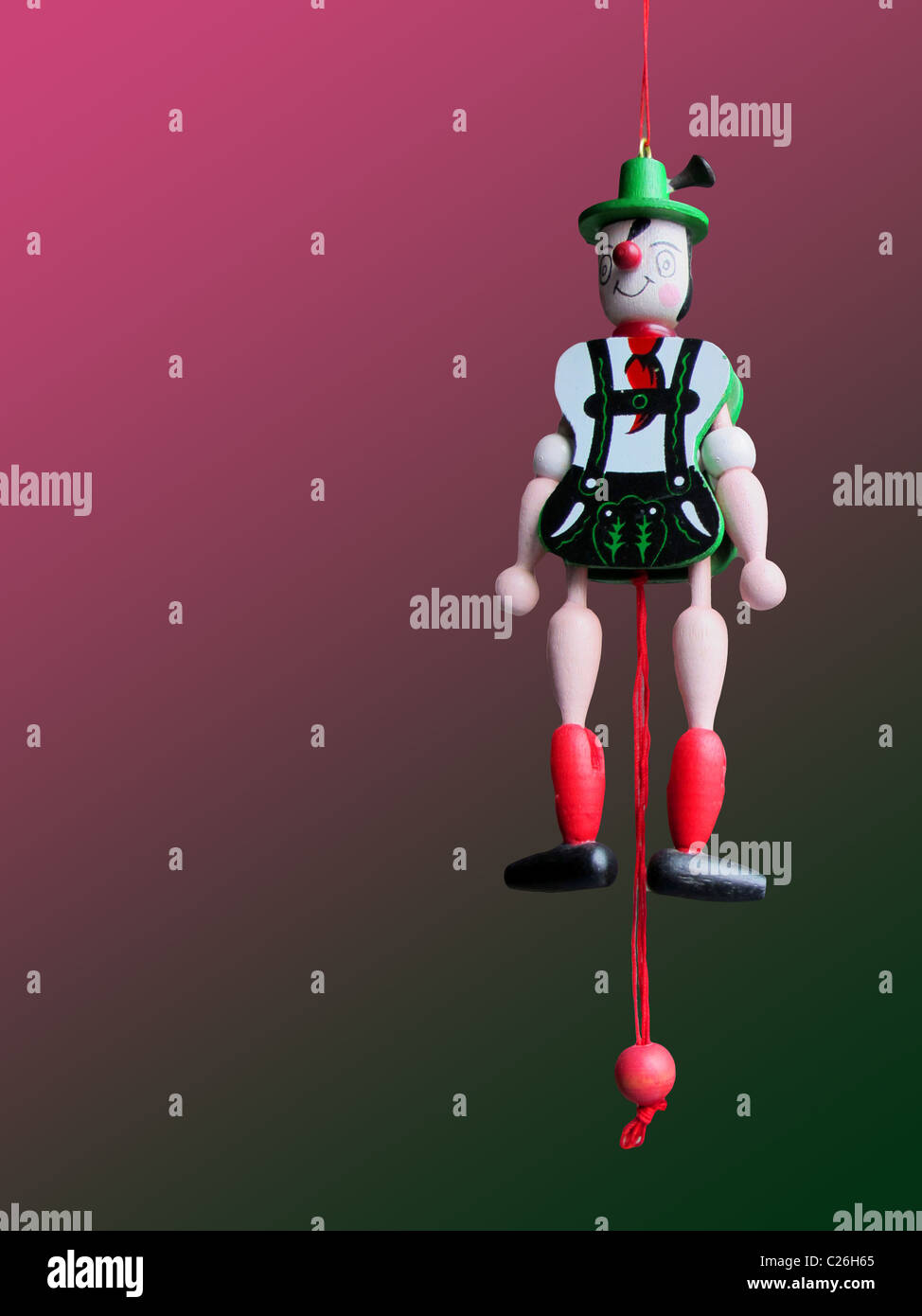 Austrian puppet on a degraded background in pink Stock Photo - Alamy