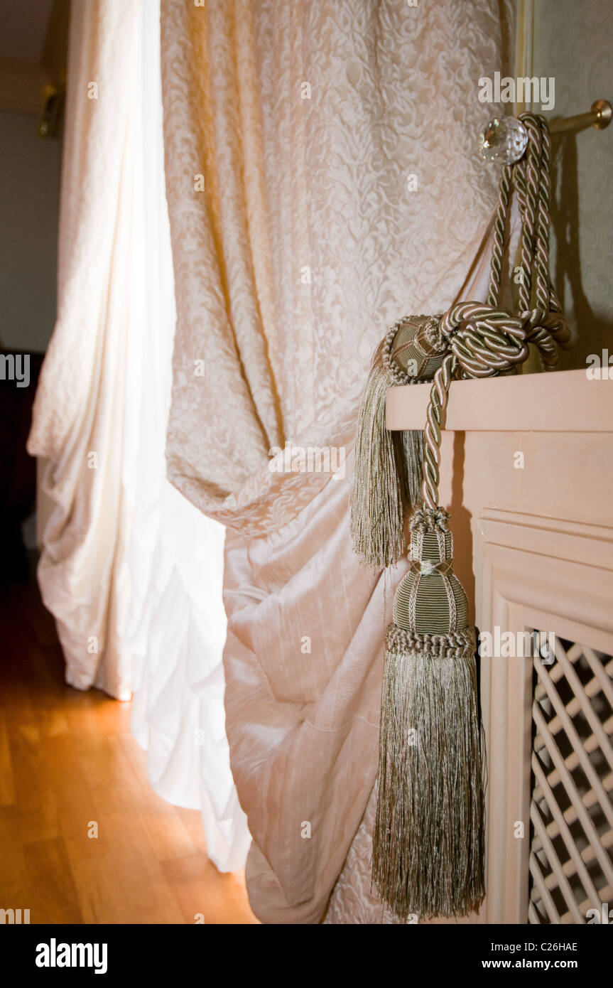 Decorated with curtains in the interior of the house Stock Photo - Alamy