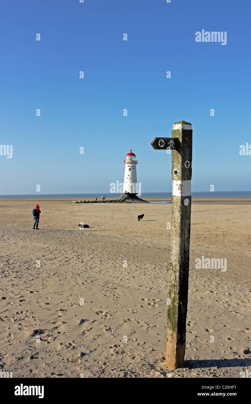 Talacre Beach lighthouse on the North Wales coast at low tide, with a ...