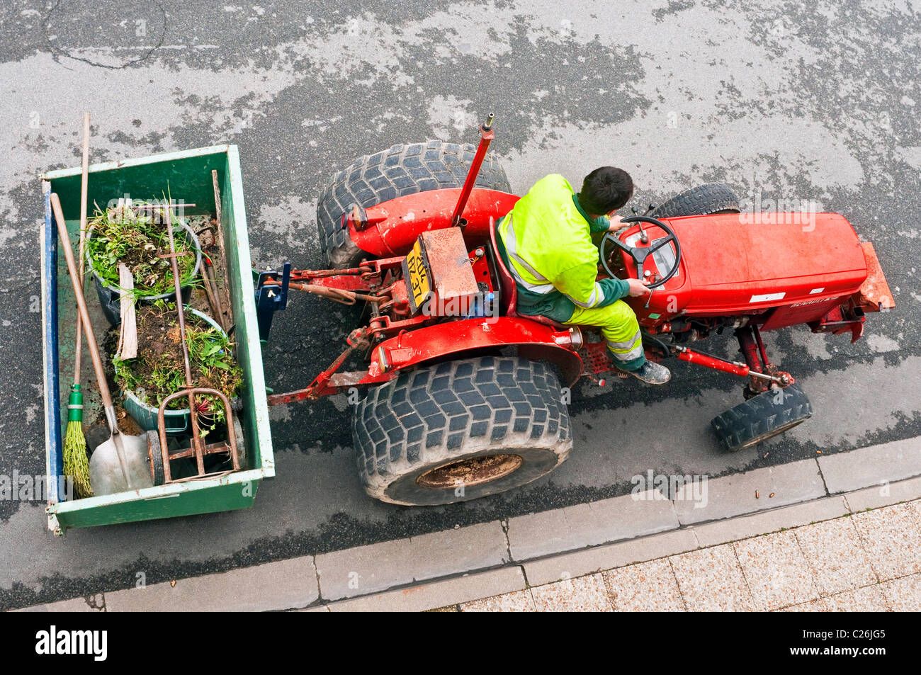 Renault tractor and loading box with gardening utensils - France Stock ...