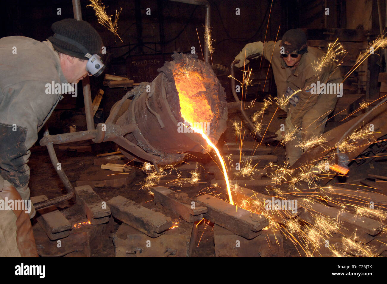 Molten steel pouring Stock Photo - Alamy