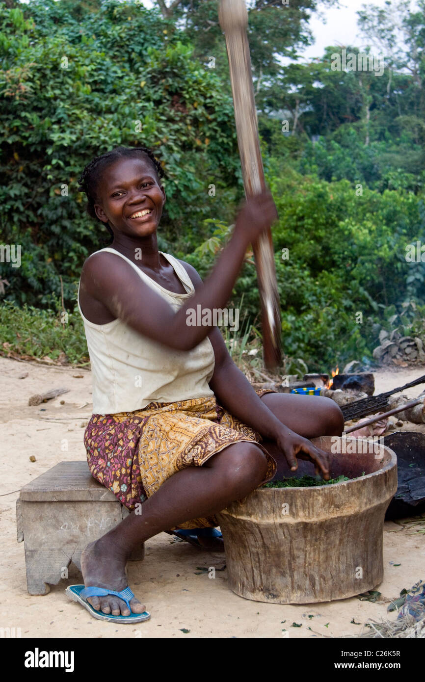 A woman mashing cassava ,Betou,Ubangi River ,Republic of Congo Stock ...