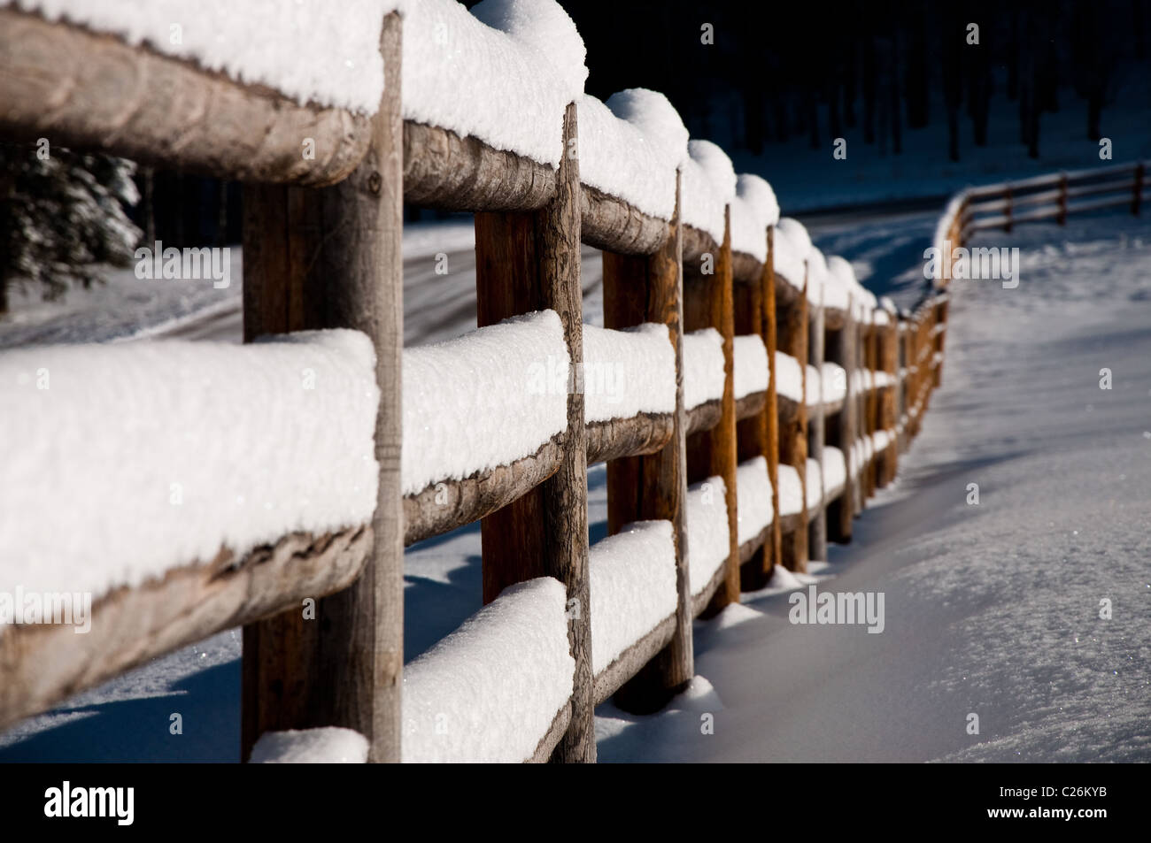 Snow covered fence Stock Photo - Alamy