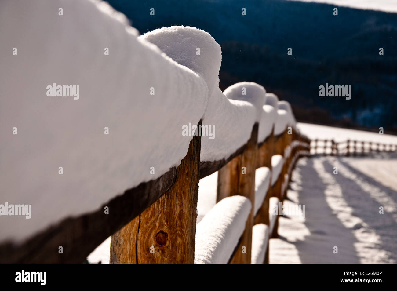 A snow covered wooden fence Stock Photo - Alamy
