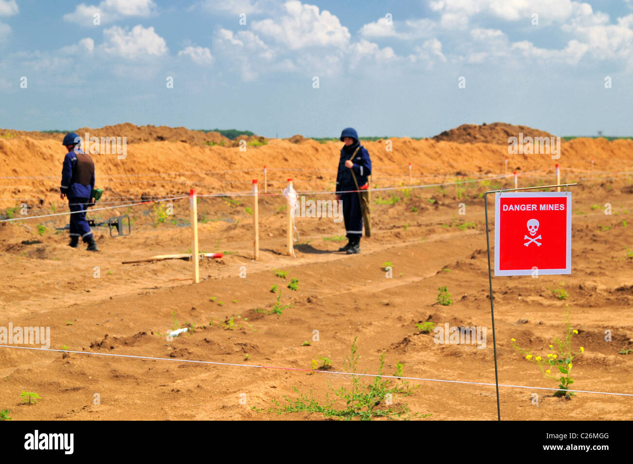Two soldiers destroy a minefield; training Stock Photo - Alamy