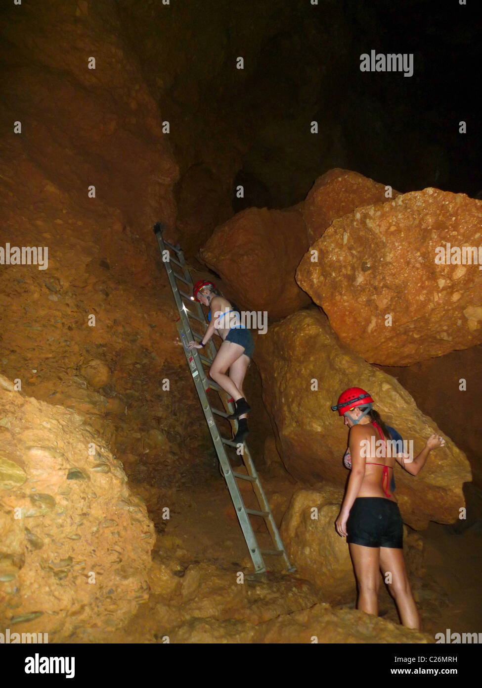 Tourists and rock formations in ATM Actun Tunichil Muknal cave in ...