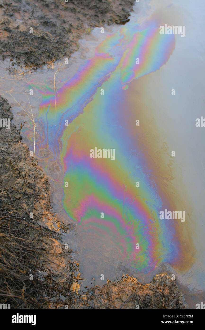 Colorful Oil Slick Spill Pollution on the water. Yamal, RUSSIA Stock ...