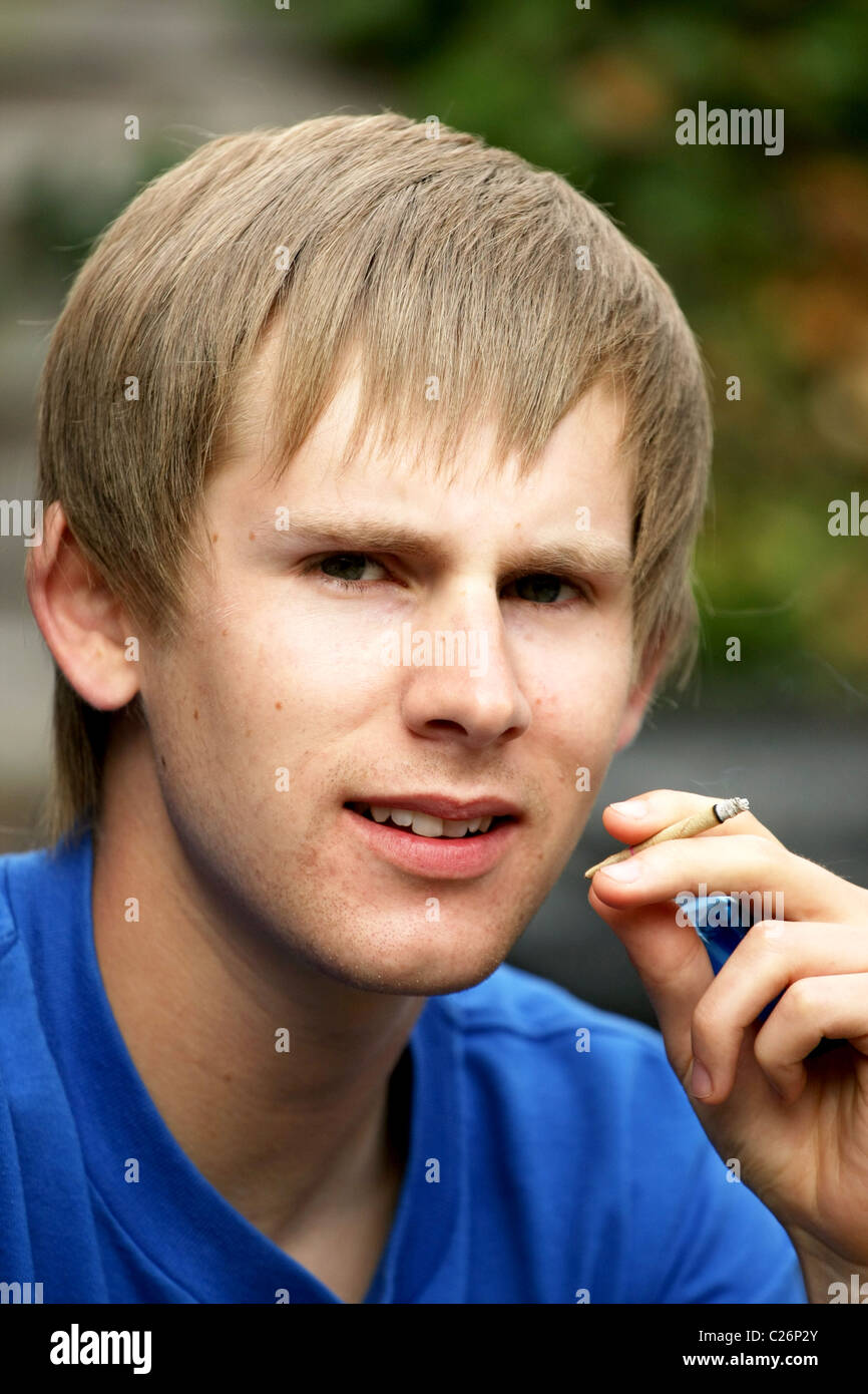 young British male smoking an Indian cigarette Stock Photo - Alamy