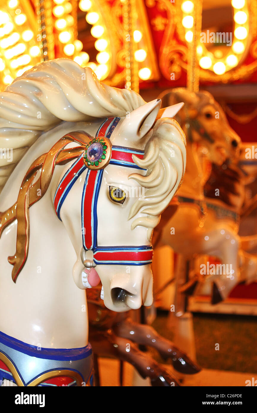 Beautifully decorated carousal horses on a merry-go-round Stock Photo ...